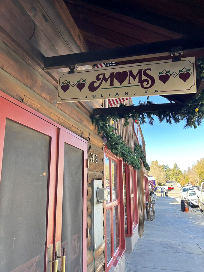 The sign promises what the pies deliver. Those little hearts aren't just decoration&mdash;they're a preview of how you'll feel after your first bite.