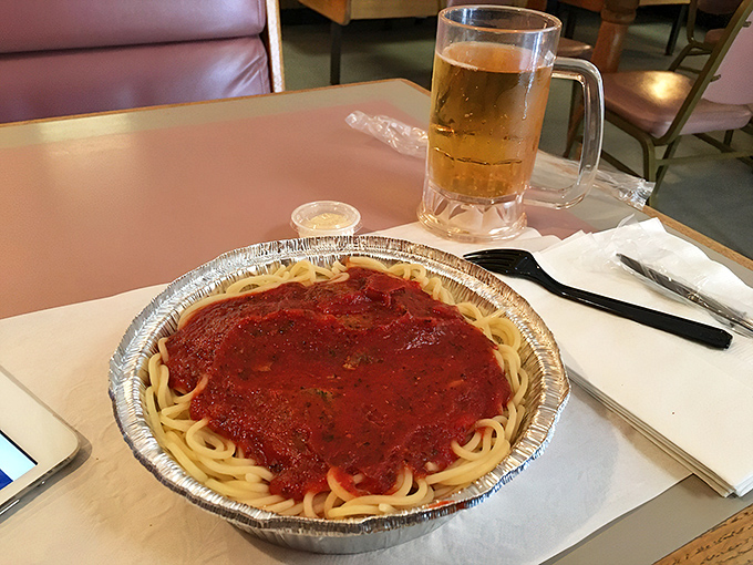 Spaghetti in a foil tin with a side of cold beer&mdash;a combination so perfectly unpretentious it makes fancy Italian restaurants seem like they're trying too hard. 