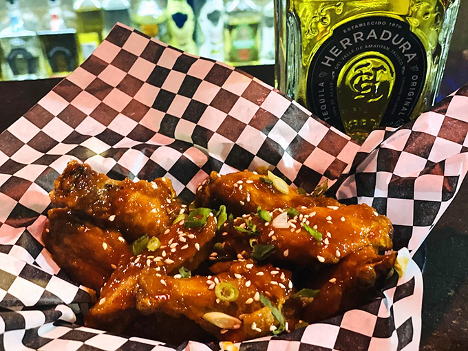 These wings aren't just tossed in sauce&mdash;they're lacquered in sticky-sweet goodness, sprinkled with sesame seeds, and begging to be devoured alongside an ice-cold beer.