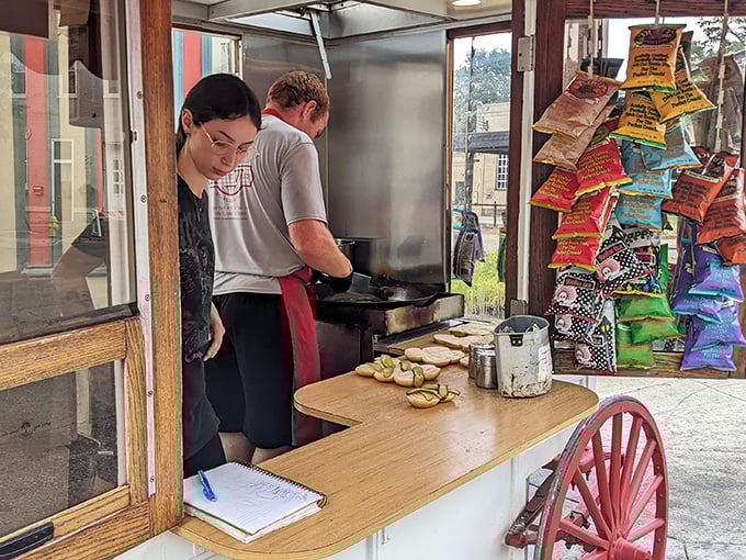 Every burger is assembled with precision and care, a time-honored ritual that transforms simple ingredients into edible history.