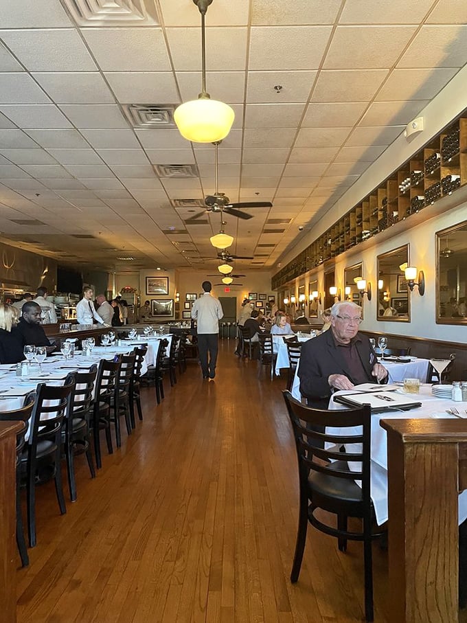 The dining room hums with the energy of satisfied patrons and attentive staff&mdash;a choreographed dance of hospitality that's been perfected over years.