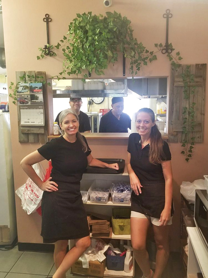 The smiling faces behind the biscuit magic. Great food always comes with a side of genuine hospitality at neighborhood gems like Oh Biscuit.