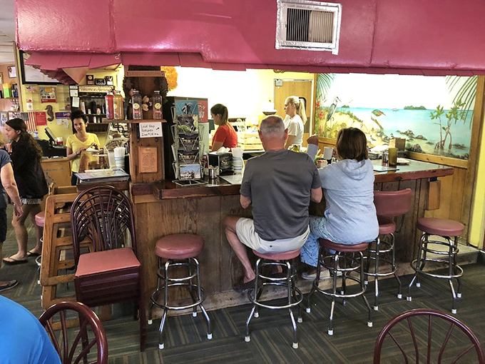 The counter seating offers front-row tickets to the breakfast show, where coffee flows freely and the staff remembers how you like your eggs.