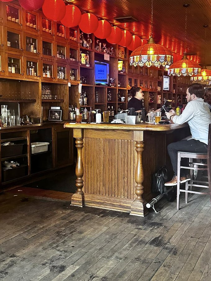 Behind every great bar is a team that knows the difference between serving drinks and creating memories. This wooden altar to libations isn't just functional &ndash; it's sacred.
