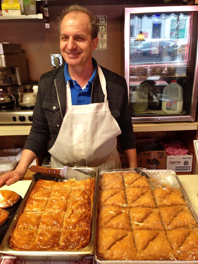 Behind every great Greek pastry is a proud baker &ndash; the architect of flaky, honey-soaked happiness that makes diets weep in defeat.