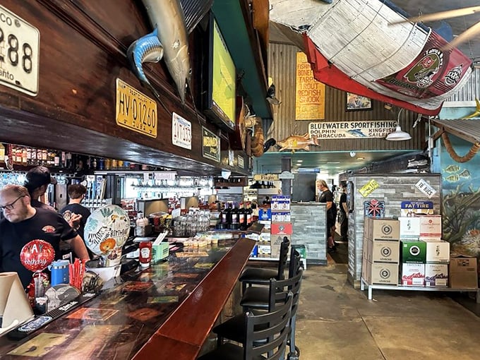 Where beer taps flow and seafood dreams come true. The license plates on the wall have seen things.