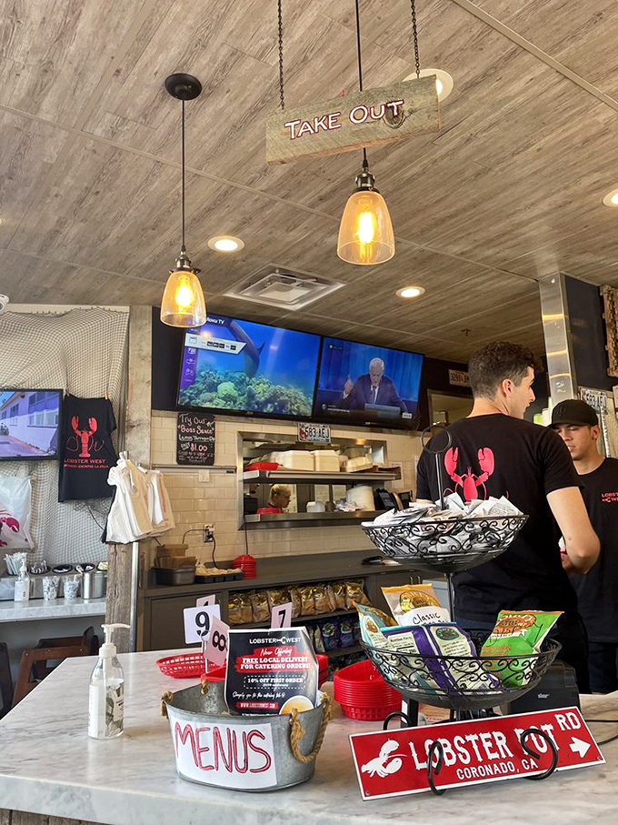 Where the magic happens&mdash;staff in their element preparing ocean-fresh delights. That hanging "Take Out" sign might be the most important directional guidance in Coronado.