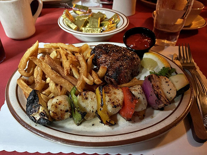 When land meets sea on a single plate, everyone wins&mdash;especially you, as that perfect steak shares real estate with grilled scallop treasures.