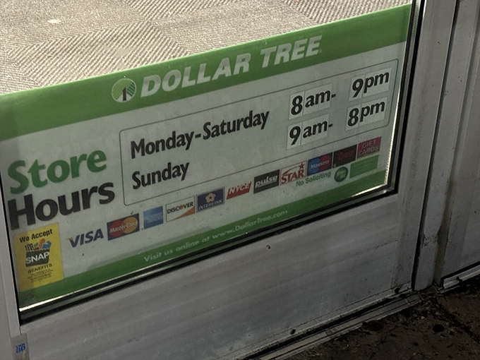 Store hours posted for the punctual bargain hunter—open seven days a week because saving money waits for no one.