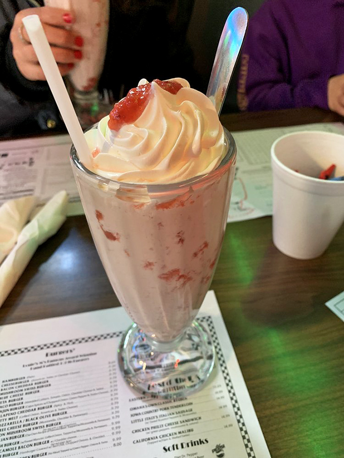A strawberry malt that transports you straight back to 1955. That swirl of whipped cream and cherry on top isn't just garnish&mdash;it's time travel.