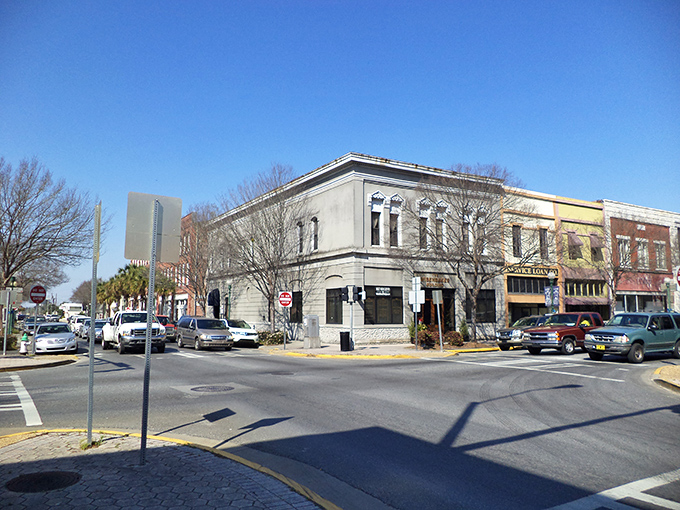 Historic storefronts house local businesses where your dollar supports neighbors, not corporations. Small-town economics at its finest.