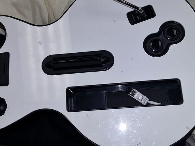 Yesterday's entertainment becomes tomorrow's retro gaming night&mdash;this Guitar Hero controller just needs someone to make it a rock star again.