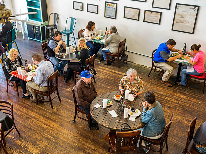 A bird's-eye view of culinary contentment. From up here, you can spot the happiest people in town&mdash;they're the ones with forks in hand.