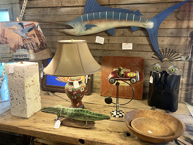 A wooden marlin watches over an eclectic collection that includes a whimsical race car lamp &ndash; proving that in this shop, nautical and whimsy coexist beautifully.