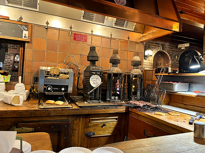 The vertical cast-iron grills look like medieval cooking instruments but produce thoroughly modern joy. These antique contraptions are the secret to Louis' legendary burgers.