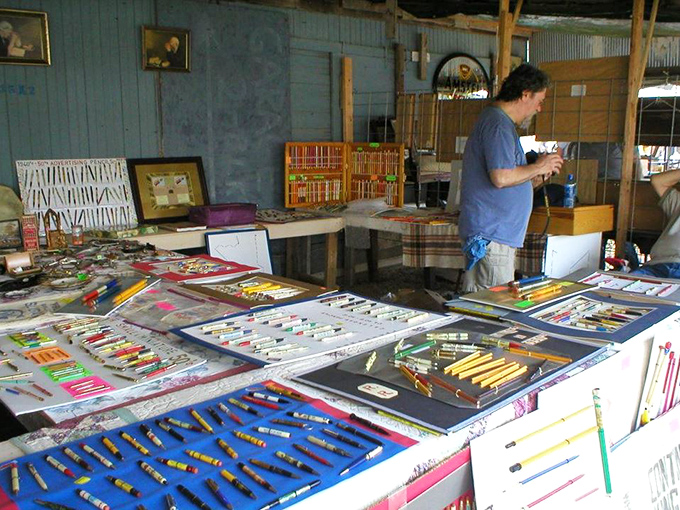 A rainbow array of vintage pens and pencils meticulously displayed&mdash;because someone out there collects everything, and thank goodness they do.