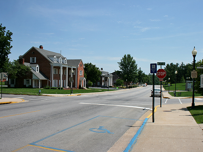 Tree-lined residential streets showcase well-maintained historic homes, where affordable housing meets architectural character in perfect small-town harmony.