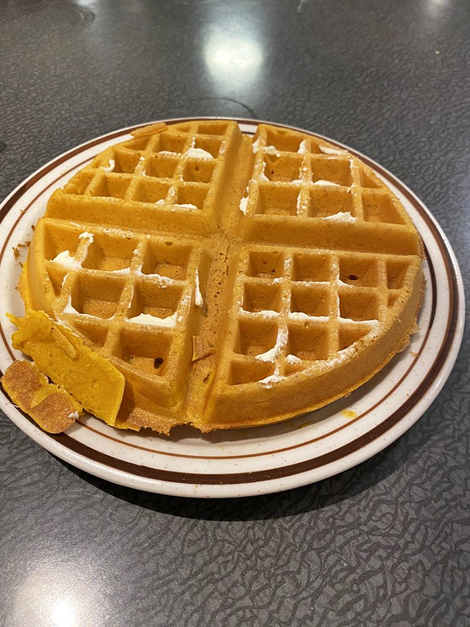 That golden waffle isn't just breakfast&mdash;it's a perfectly engineered grid of happiness with pockets specifically designed for butter and syrup collection.