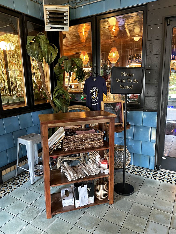 Even the entrance says "you're about to have a great time." That blue exterior and wooden host stand set the stage for tropical delights.