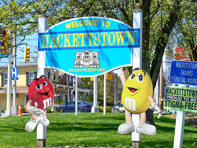 M&M characters stand guard at the town welcome sign, reminding visitors of Hackettstown's sweetest claim to fame. When chocolate mascots welcome you, you know you're somewhere special.