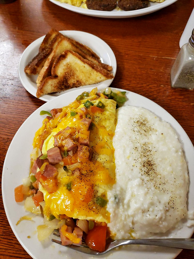 Western omelets are the cowboys of breakfast&mdash;rugged, colorful, and full of character. This one rides alongside creamy grits like they've been partners for years.