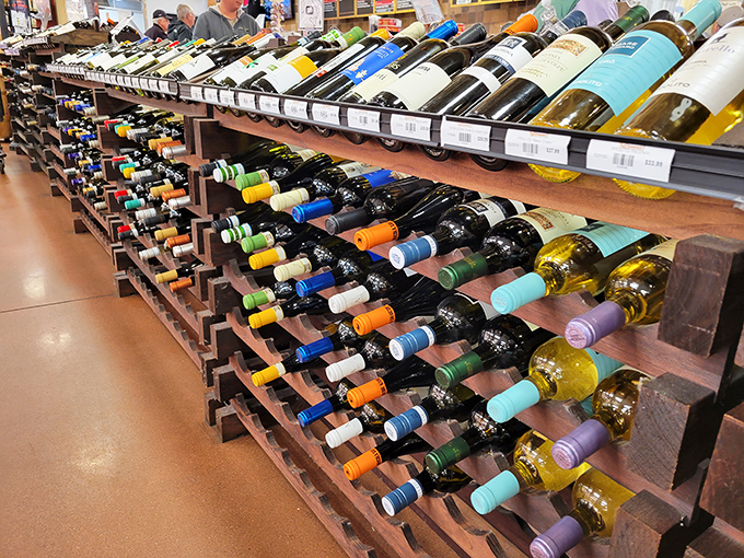 A wooden library of bottled poetry—each wine telling stories of specific hillsides, particular sunsets, and generations of Italian craftsmanship.