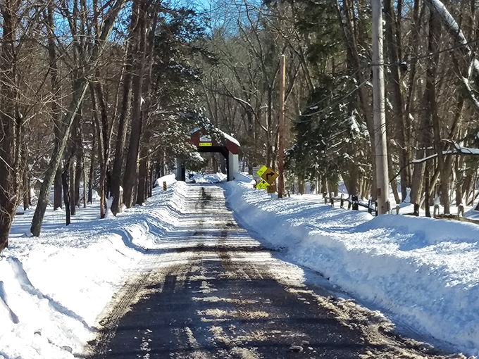 Winter blankets the approach in pristine white. The bridge stands like a beacon, saying "Yes, we're still open&mdash;Pennsylvania doesn't close for snow."