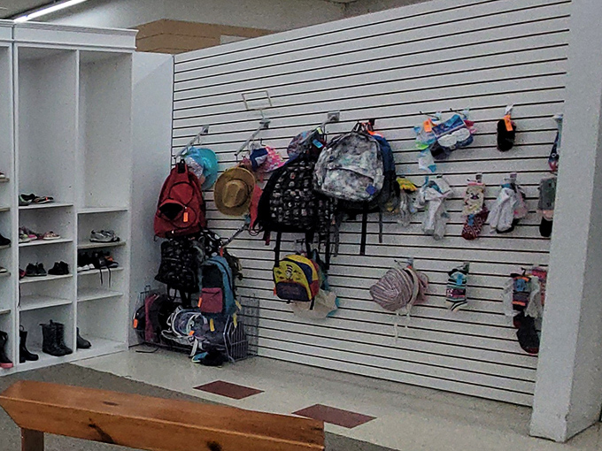 Backpacks and bags hang like colorful fruit, ripe for the picking. School supplies with stories to tell and adventures yet to have.