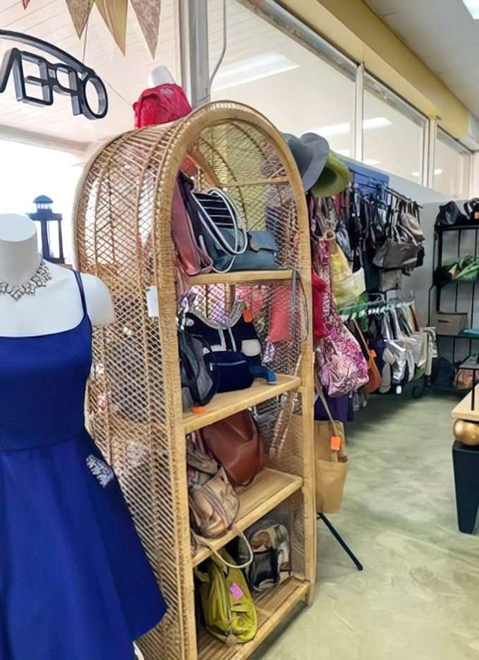 Vintage display solutions add charm to the shopping experience. This wicker shelf showcases handbags waiting for their second act.