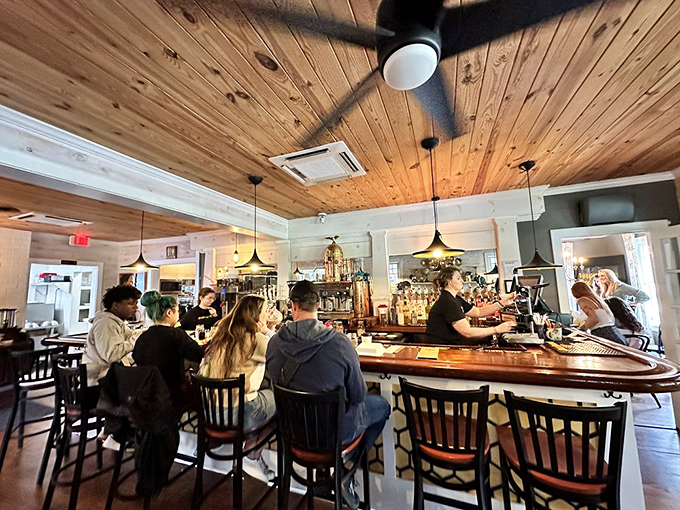 The bar area buzzes with weekend energy &ndash; wooden ceilings, pendant lighting, and the unmistakable vibe of people who've made the right breakfast choice.