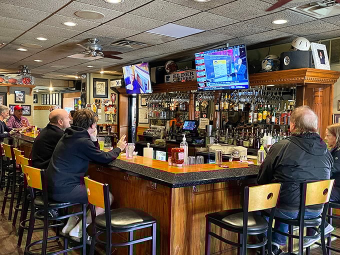 The bar area—where Cincinnati sports victories and defeats are celebrated or mourned with equal passion. Every city needs these communal living rooms.