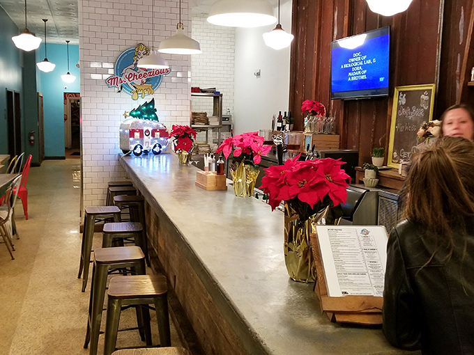 The bar area feels like the cool friend's kitchen where everyone naturally gathers during parties.