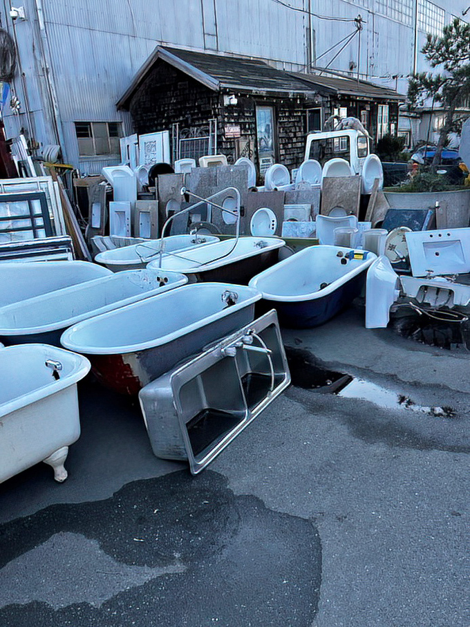 The bathtub graveyard: where porcelain beauties await resurrection in someone's bathroom renovation. Soak in the possibilities!