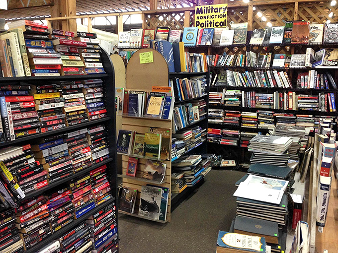 Literary treasures stacked floor to ceiling&mdash;a bibliophile's dream where dog-eared paperbacks share shelf space with leather-bound classics.