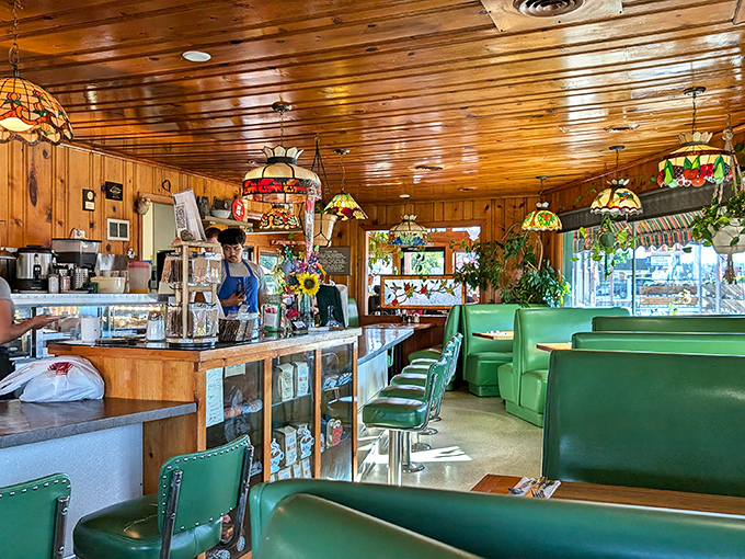 Stained glass lamps cast a warm glow over mint-green booths. This isn't just a restaurant&mdash;it's a time machine to when dining out was an occasion.
