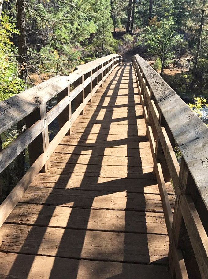 Crossing this wooden bridge feels like stepping into a scene from "Stand By Me," minus the train and adolescent existential crises.