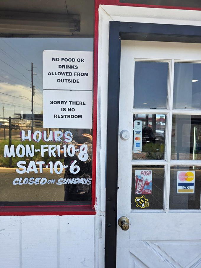 Hours posted with refreshing honesty. No QR codes, no apps, no nonsense &ndash; just straightforward information about when to get your burger fix.