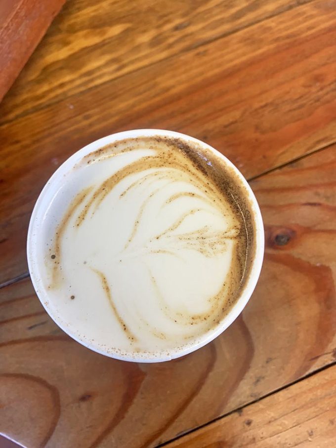 This latte isn't just a drink, it's a warm hug in a cup, with latte art so pretty you almost feel bad disturbing it. Almost.
