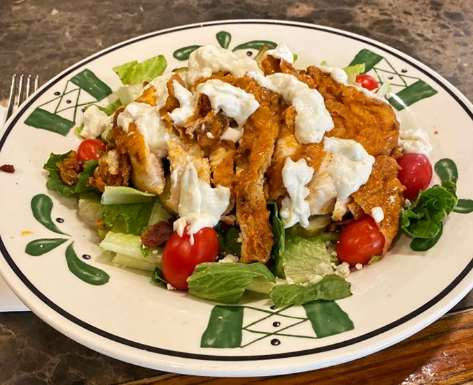 A salad that doesn't apologize for being healthy&mdash;crisp greens and juicy tomatoes playing backup to perfectly seasoned chicken.