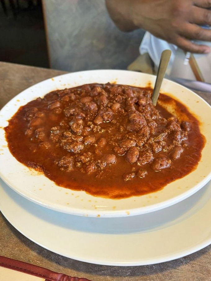 This isn't your "opened a can and added hot sauce" chili. This is the "simmered all day while someone's grandmother supervised" kind.