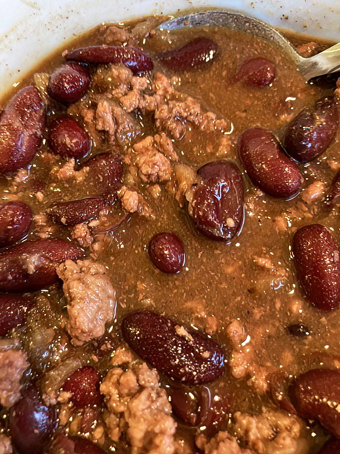 This isn't just chili &ndash; it's a spicy, bean-studded hug in a bowl, offering warmth that reaches beyond temperature into something resembling contentment.