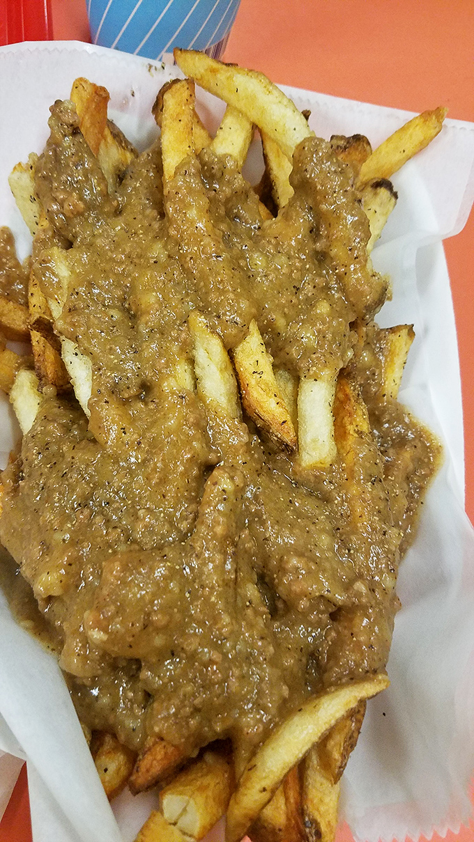 Fries smothered in that legendary chili sauce. Not "loaded" or "ultimate"&mdash;just honestly, gloriously covered in meaty goodness that defies description.