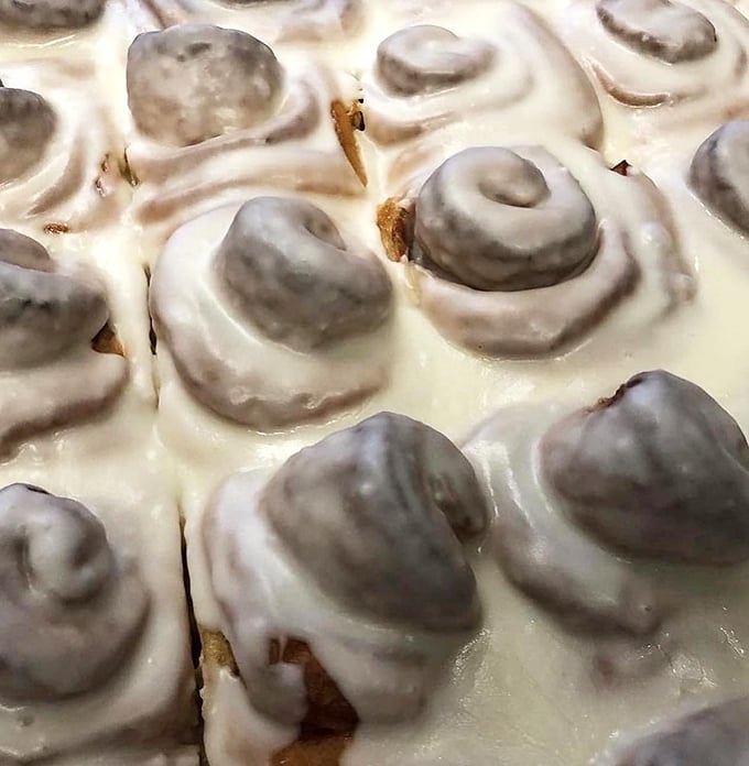 Cinnamon rolls bathing in cream cheese frosting. If clouds were edible, this is exactly what they'd taste like.