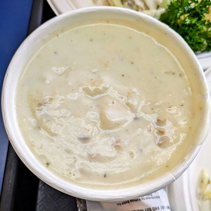 The legendary clam chowder&mdash;a velvety sea of flavor where tender clams play hide and seek, making each spoonful a delightful treasure hunt.