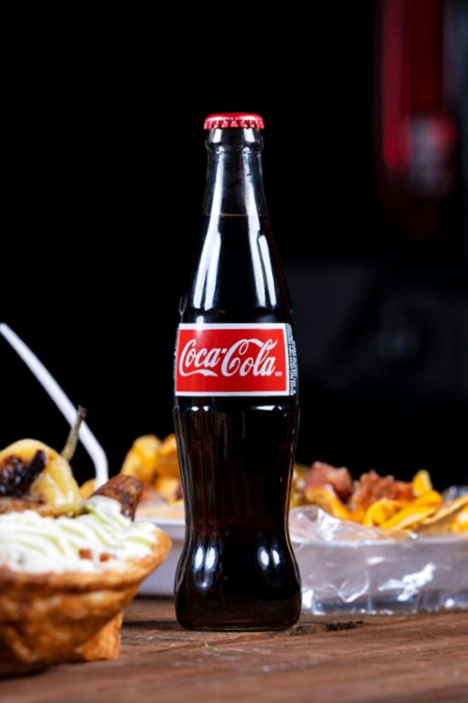 The classic companion to culinary adventure. That Mexican Coca-Cola's real sugar makes American Coke taste like it's trying too hard.