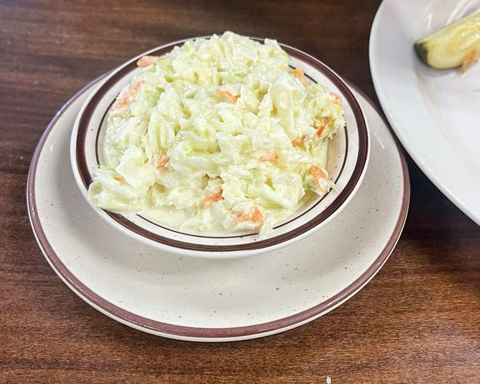Coleslaw that refuses to be a mere side dish. Crisp, creamy, and bright enough to hold its own against the heartiest main courses.