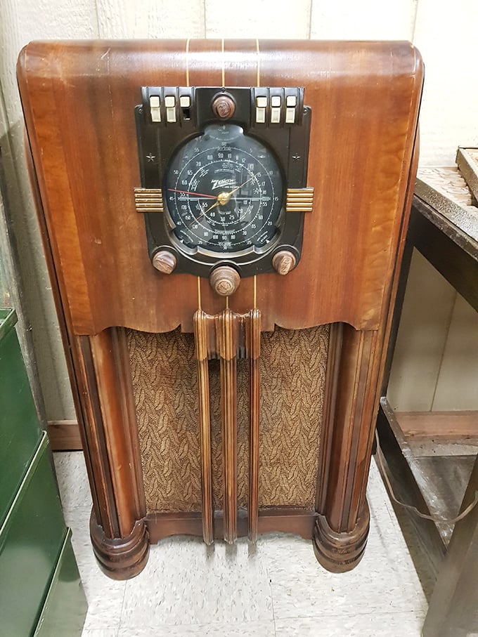 This isn't just a vintage radio; it's a wooden portal to evenings when families gathered to hear FDR's fireside chats instead of scrolling through Instagram.