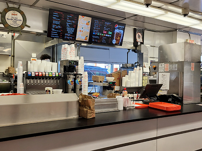 The counter where burger dreams come true, efficiently serving generations of Ohioans with the same no-nonsense approach since day one.