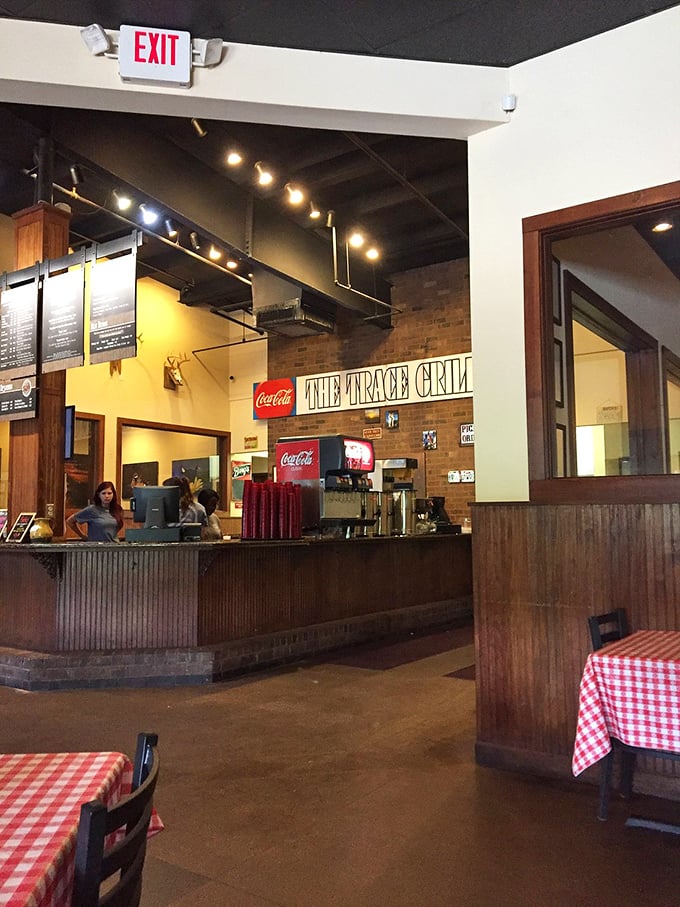 The counter where magic happens&mdash;where orders go in and plates of Southern comfort emerge. Notice the red-checkered tables standing ready for action.