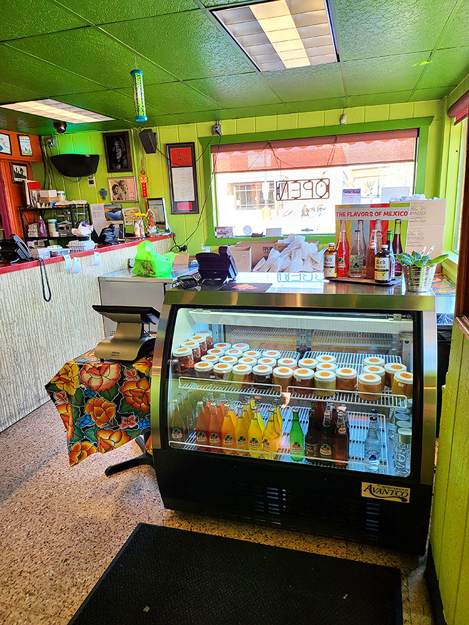 The counter area pops with lime green walls and cold beverages, a refreshing oasis that says, "Yes, we take our food seriously, but we're still having fun."